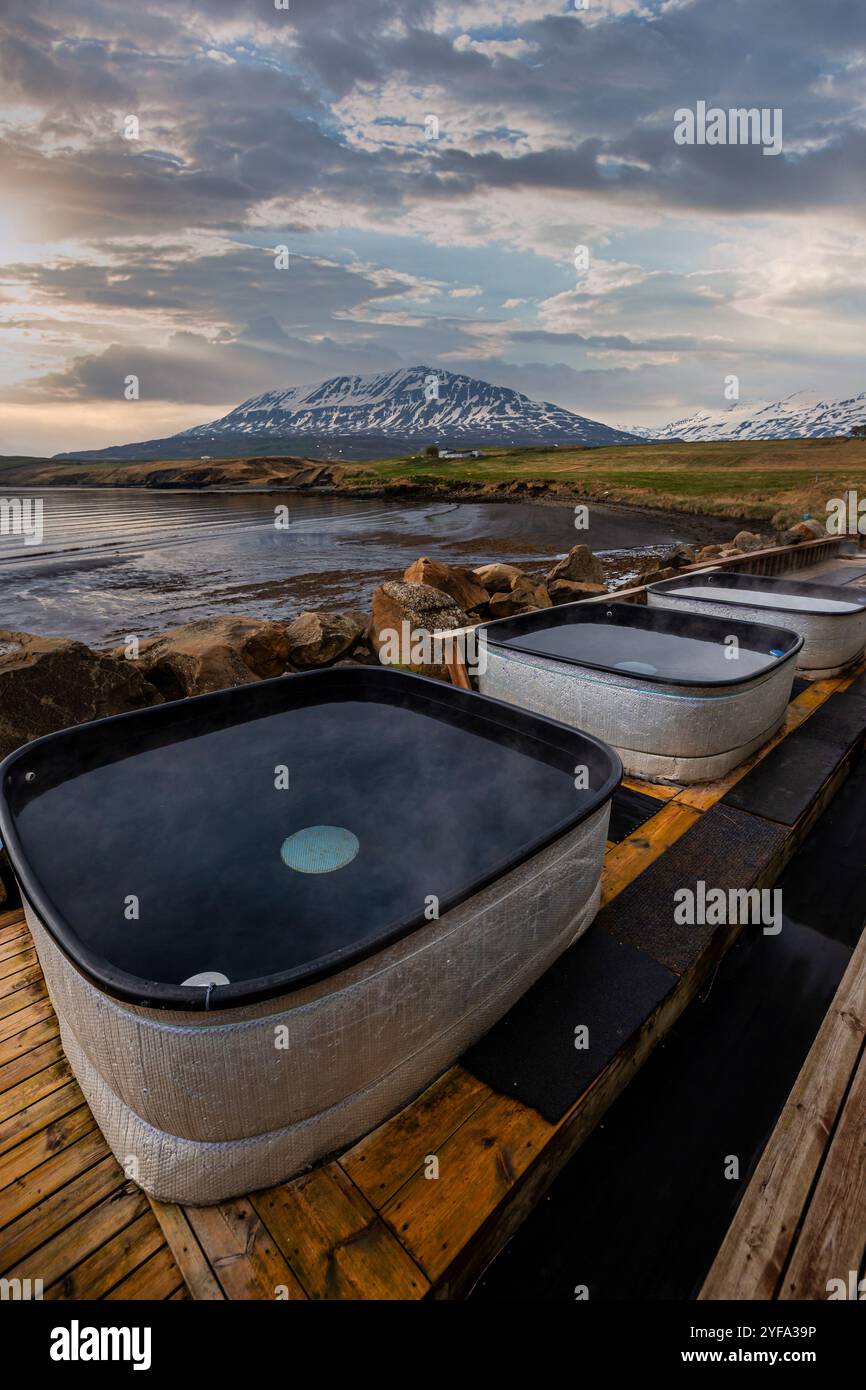 Hauganes Geothermal hot tubs with a view of Icelandic mountains and ...