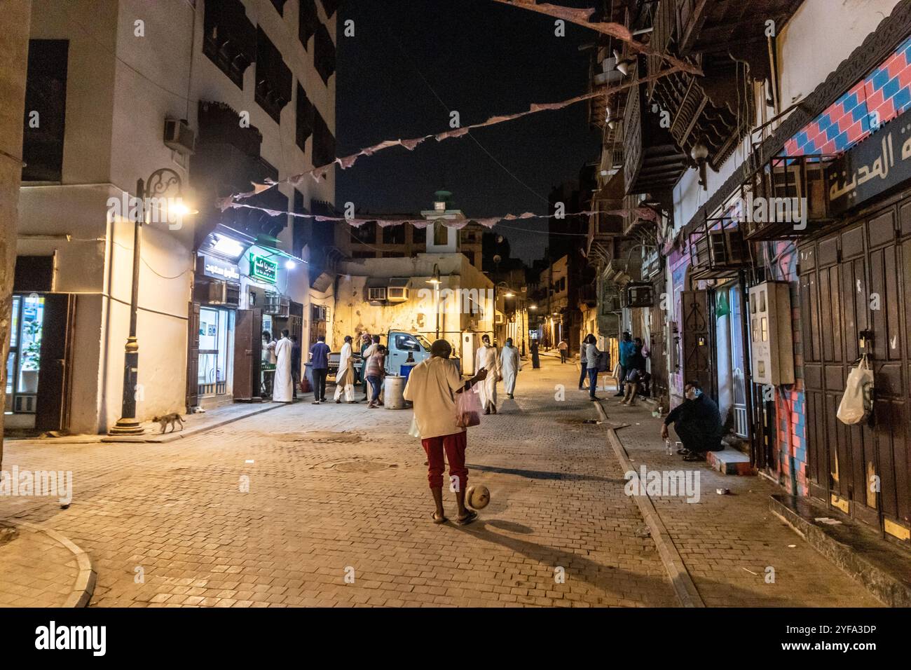 JEDDAH, SAUDI ARABIA - NOVEMBER 15, 2021: Night view of a street in Al ...