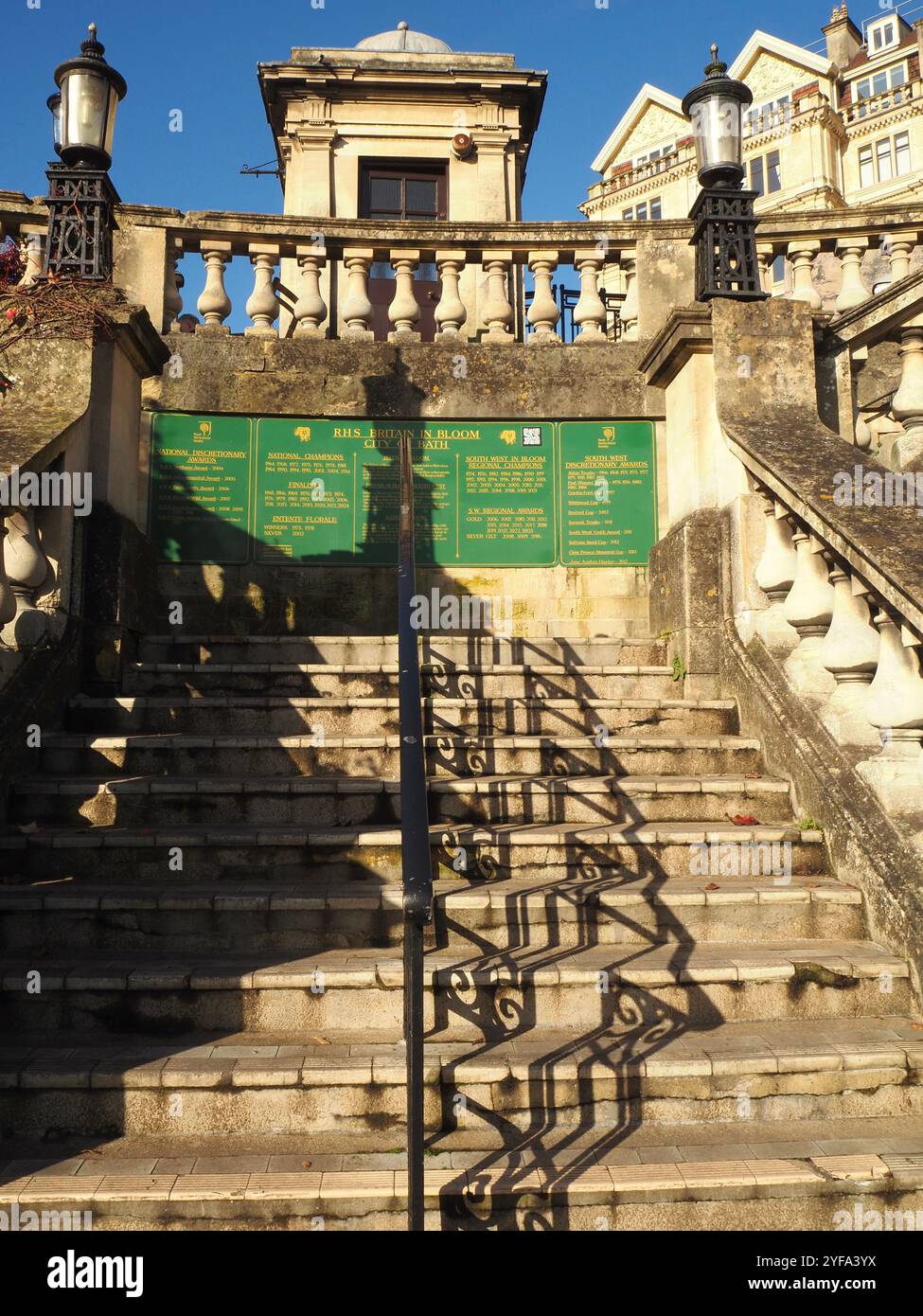 Britain in Bloom plaque at the top of a flight of Georgian stone steps ...