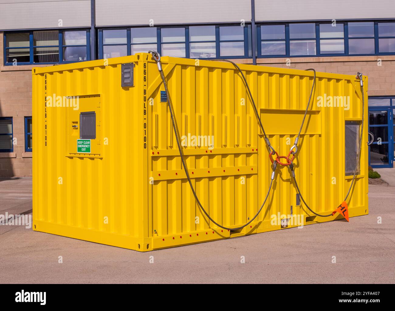 Yellow shipping container Stock Photo - Alamy