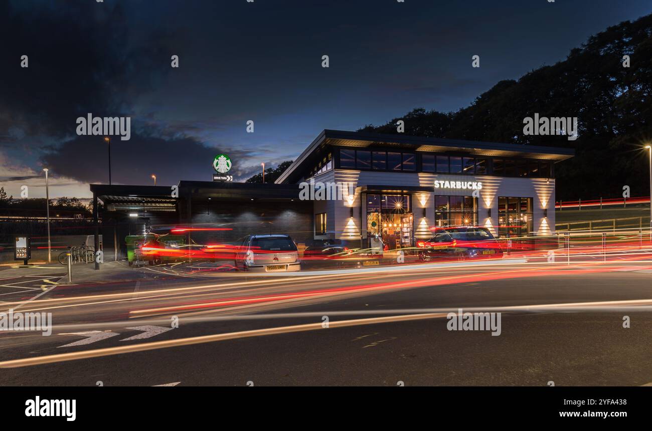 Starbucks coffee drive through building Stock Photo - Alamy