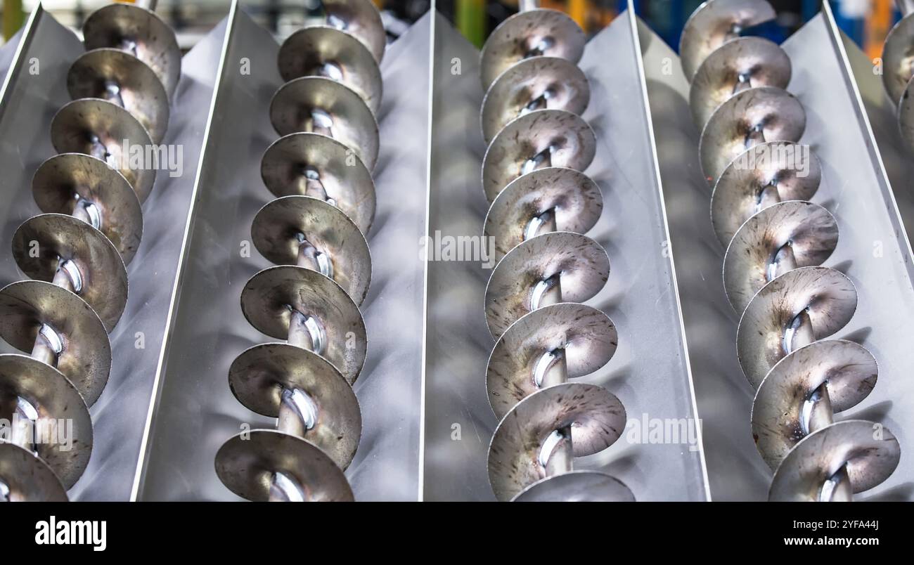 Steel augers close up Stock Photo - Alamy