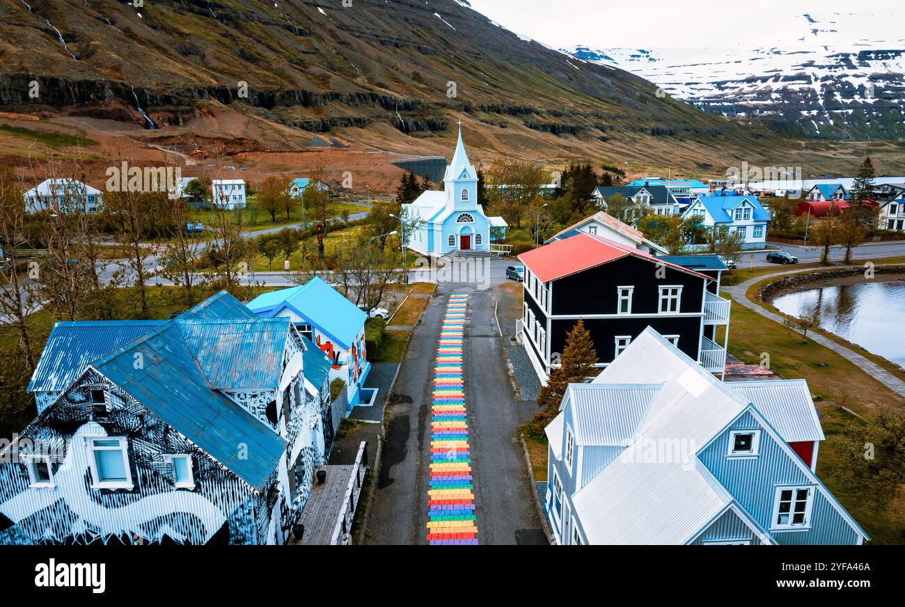 Aerial view of the Seydisfjordur town in Iceland. The famous rainbow ...