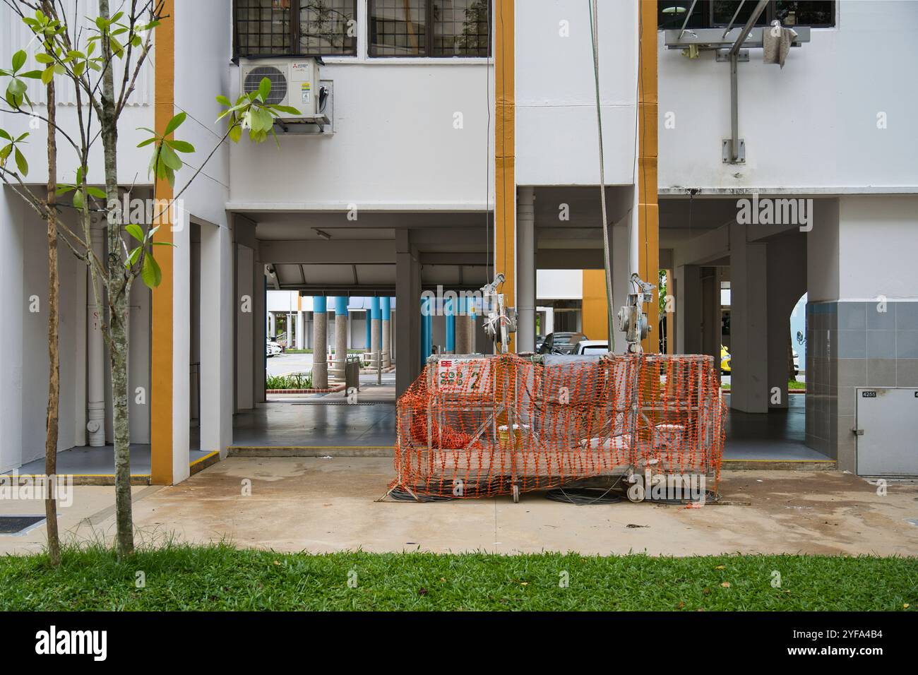 Singapore, 10 Dec 2023: A gondola suspended lift platform on the ground ...