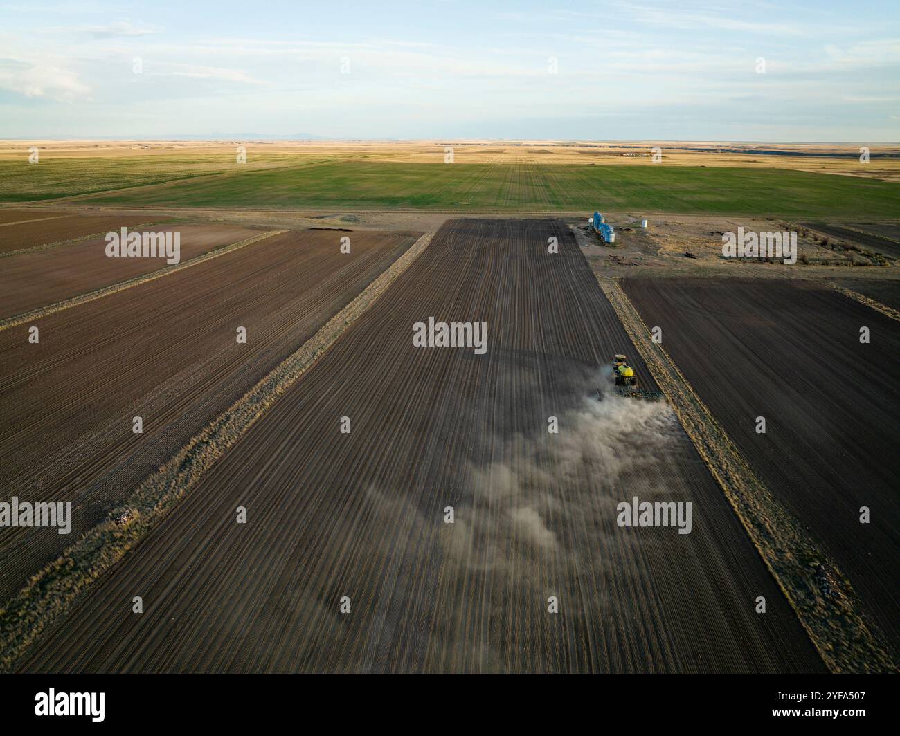 Aerial view of a tractor seeding a massive dryland wheat field Stock ...