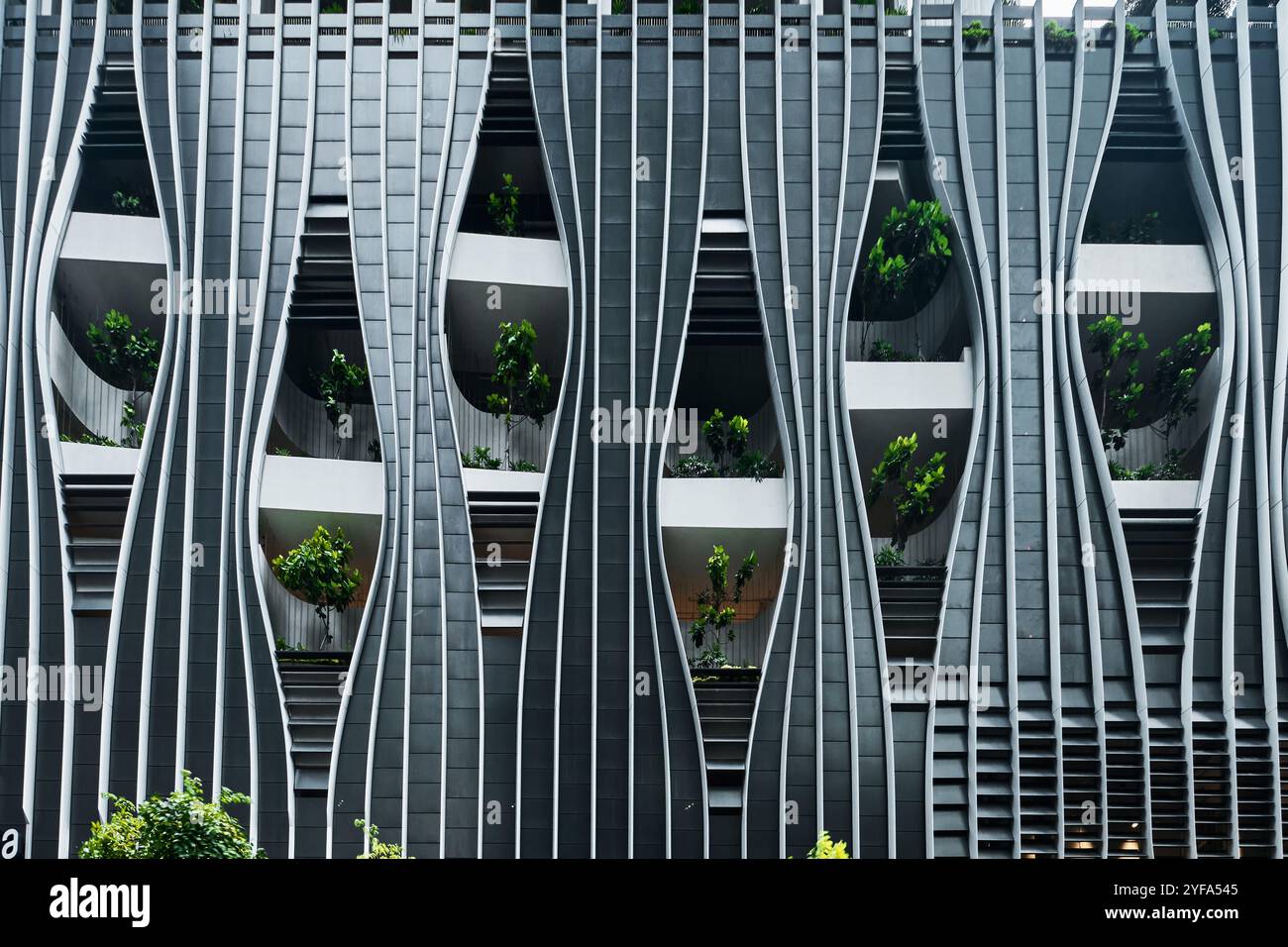 Singapore - August 12, 2024: CapitaSpring skyscraper with unique ...