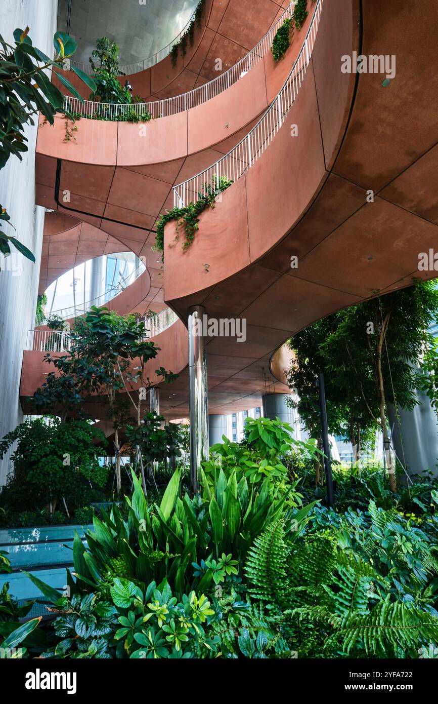 Singapore - August 16, 2024: CapitaSpring skyscraper with walkways and ...