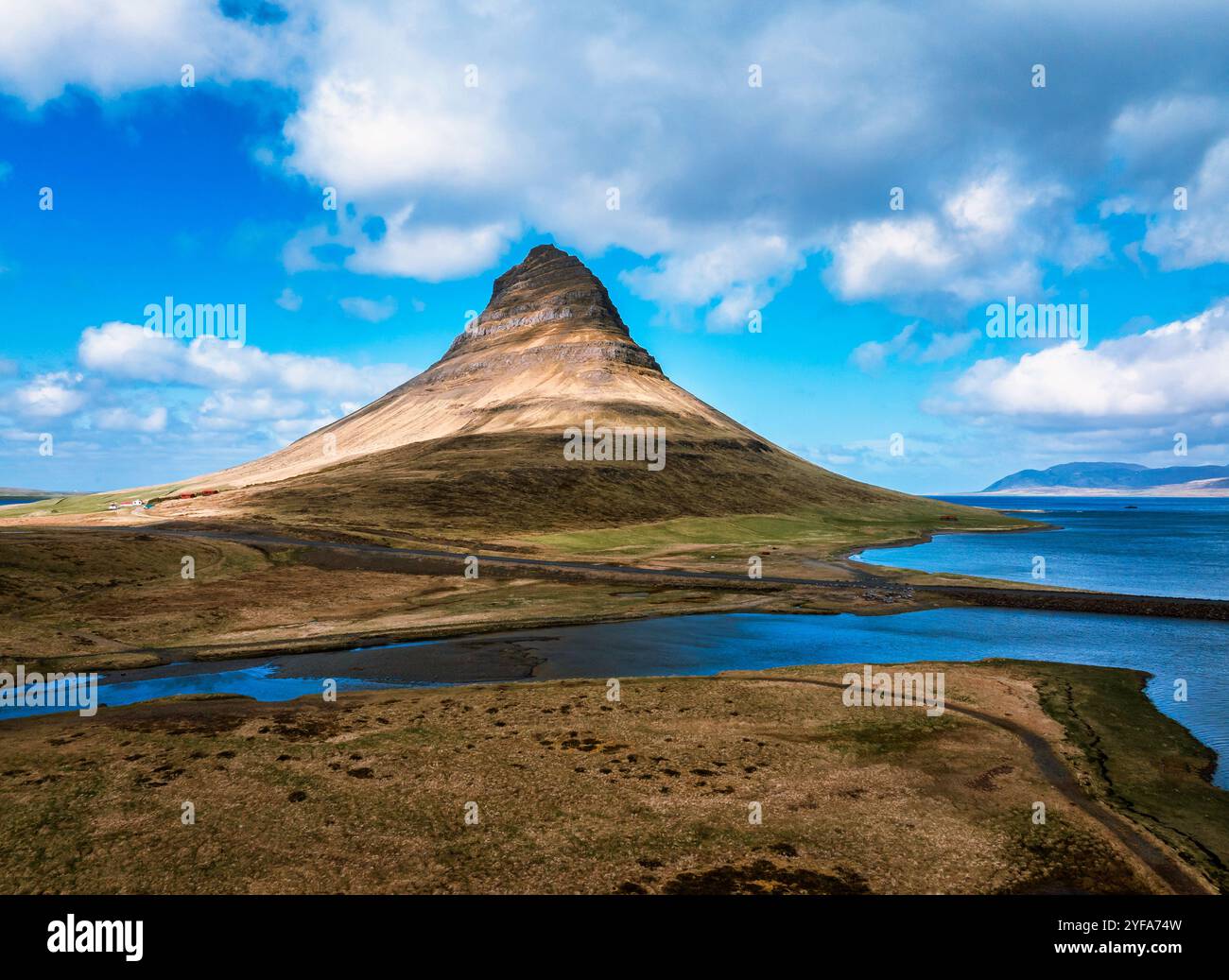 Stunning aerial view of Kirkjufell Mountain in Iceland with cascading ...