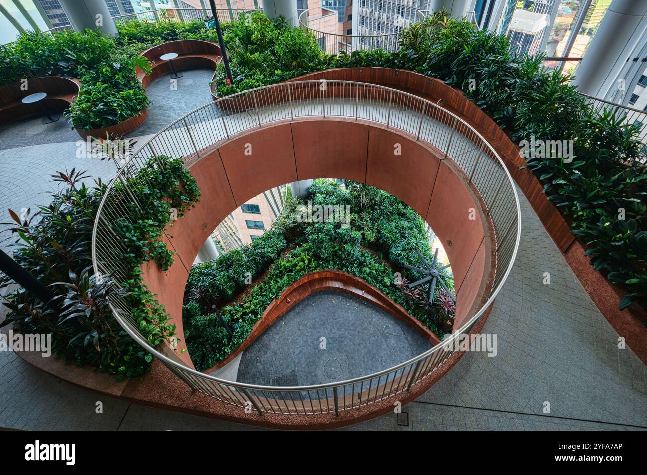 Singapore - August 16, 2024: CapitaSpring skyscraper with walkways and ...