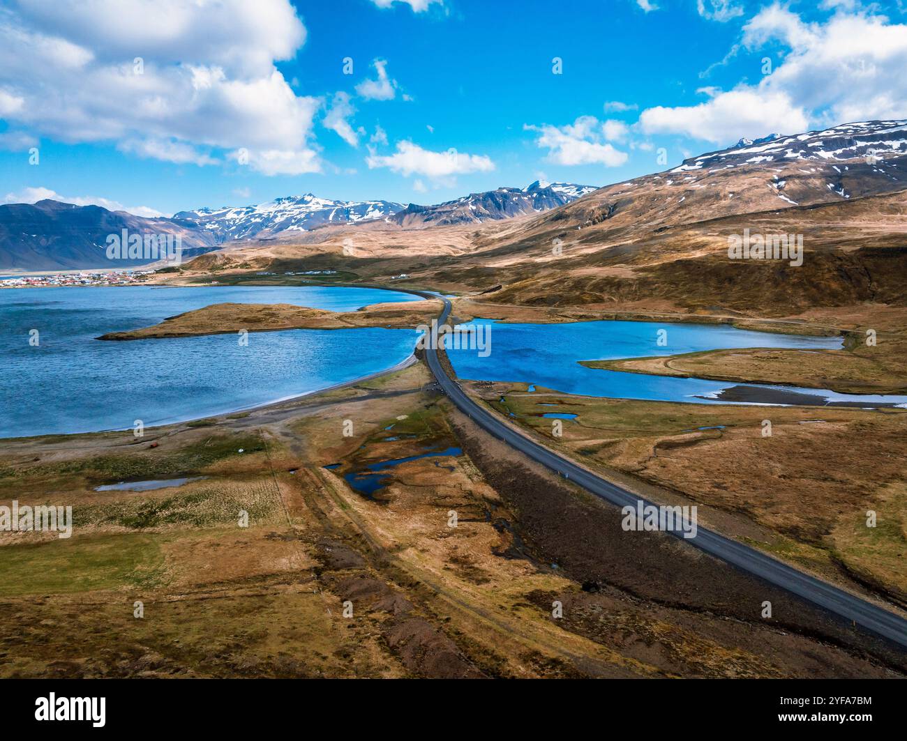 Scenic aerial view of Icelandic landscape with winding road, blue lakes ...