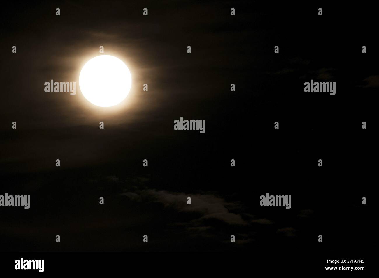Full moon partially covered hi-res stock photography and images - Alamy