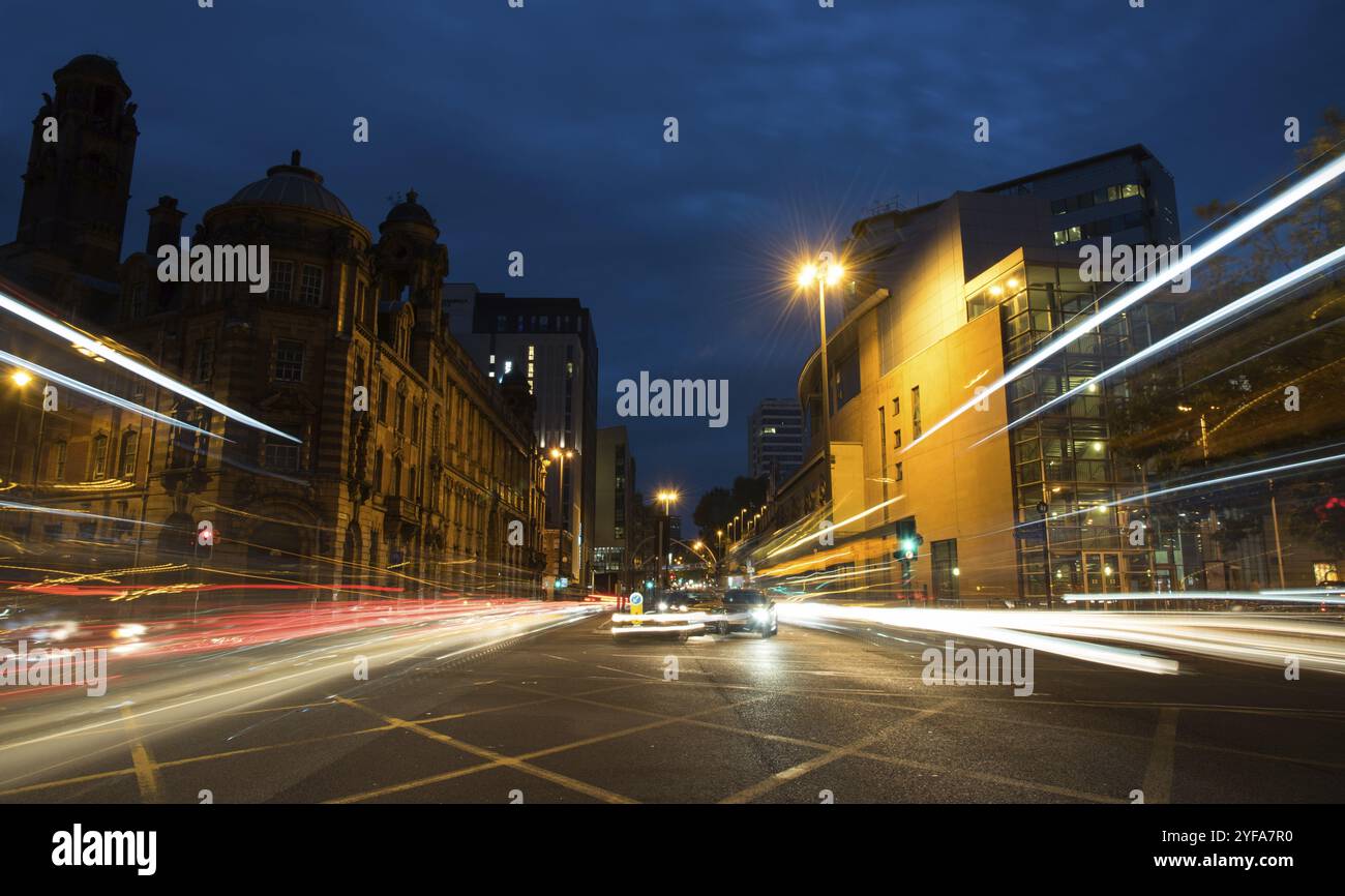 Light trails of cars and buses moving with speed at Piccadilly avenue ...