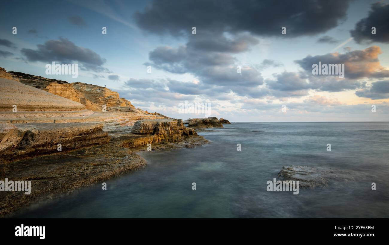 Rocky seashore seascape with wavy ocean and dramatic and beautiful ...