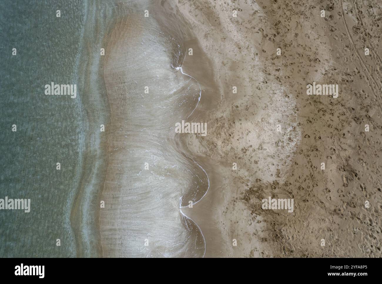 Aerial view drone of empty tropical sandy beach with golden sand ...
