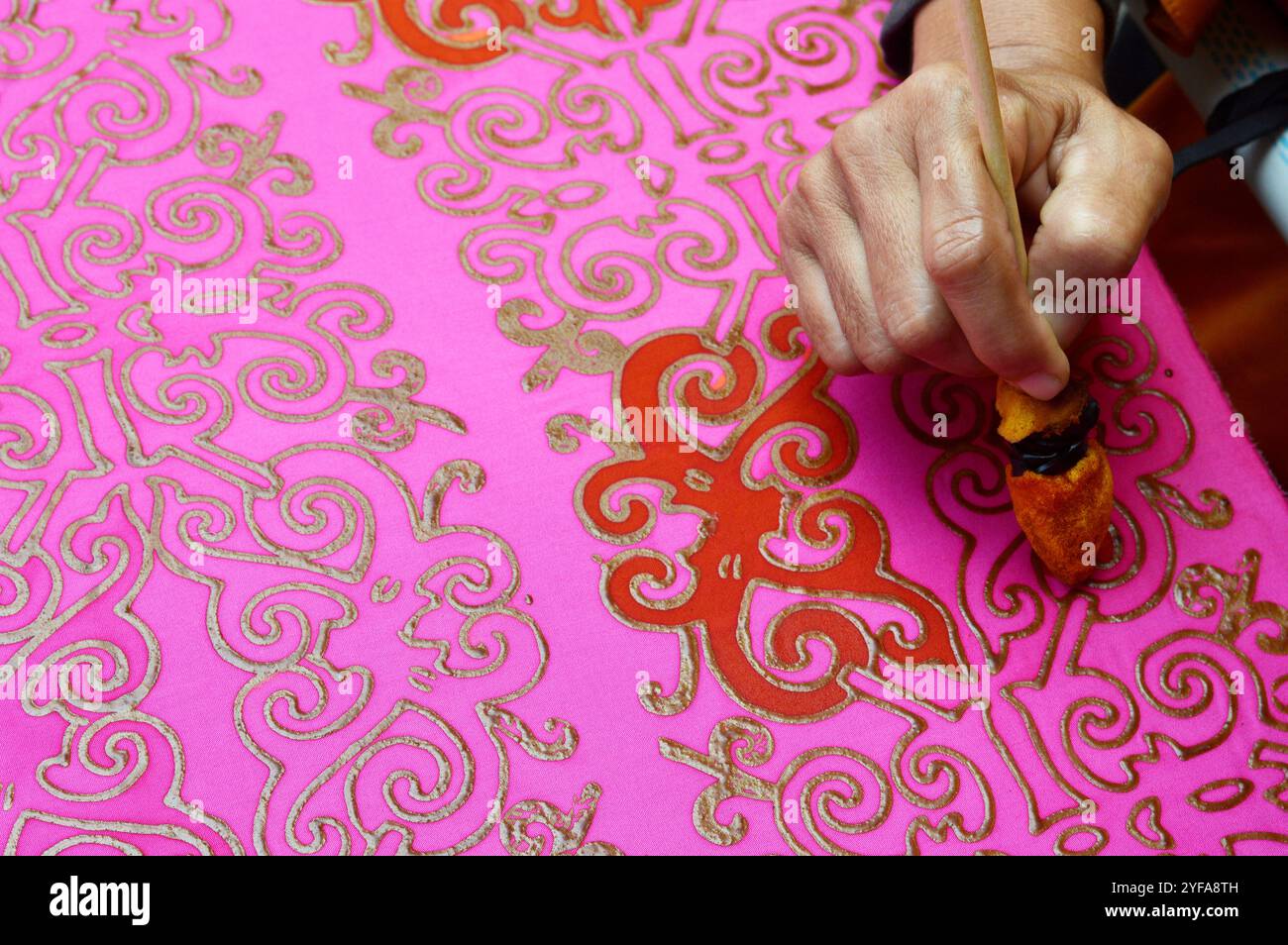 coloring process on Indonesian batik cloth Stock Photo - Alamy