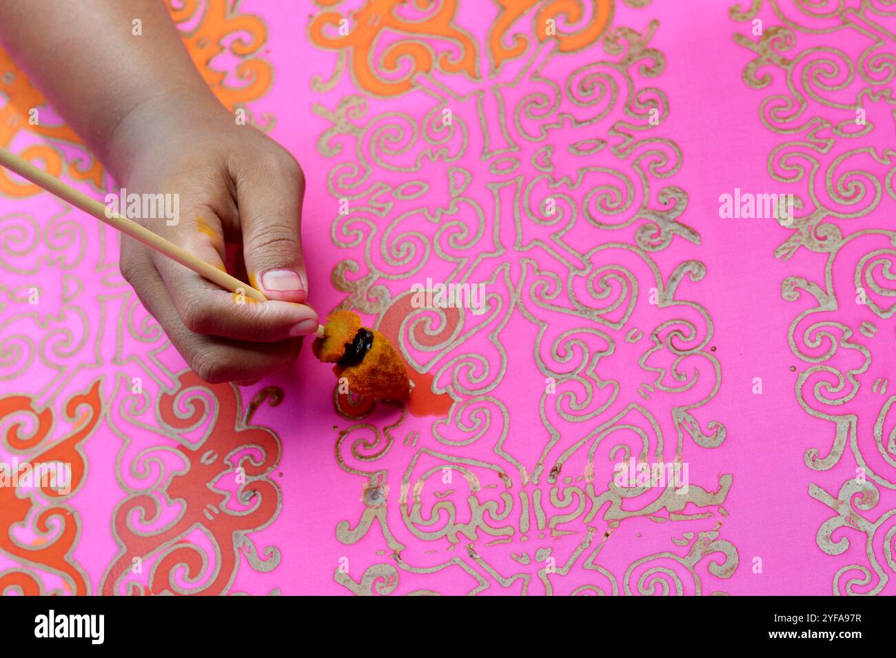 coloring process on Indonesian batik cloth Stock Photo - Alamy
