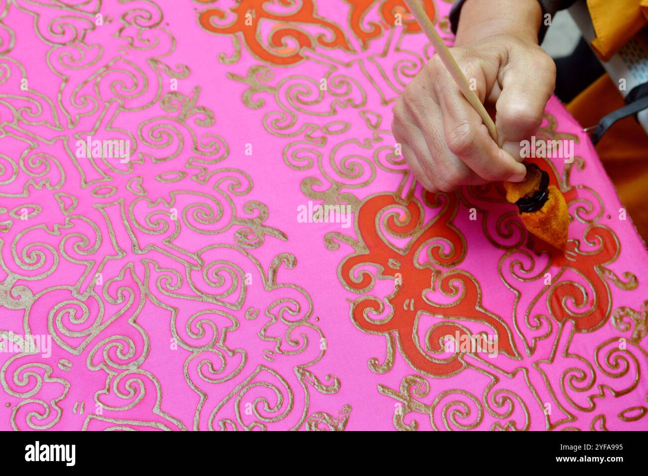 coloring process on Indonesian batik cloth Stock Photo - Alamy
