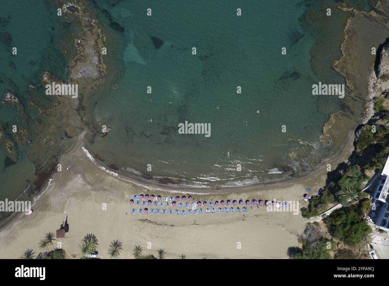 Drone aerial scenery of a sandy bay tropical beach for swimming. Summer ...