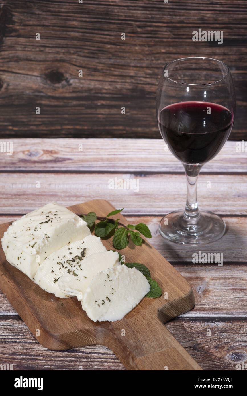Traditional cyprus halloumi cheese and red wine on a table Stock Photo ...