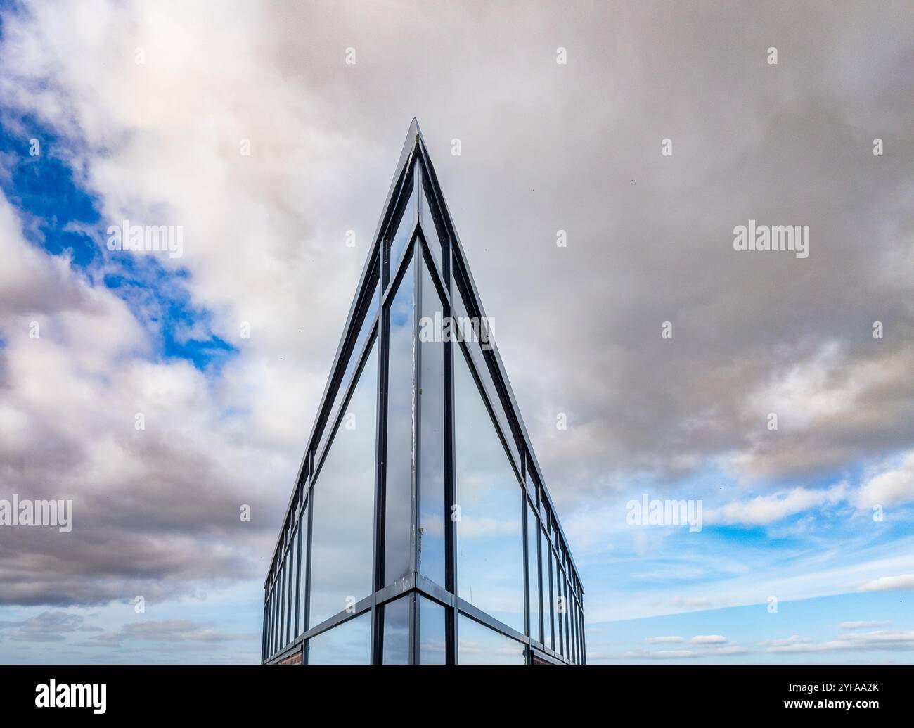 top edge of a glass facade of a modern office building Stock Photo - Alamy