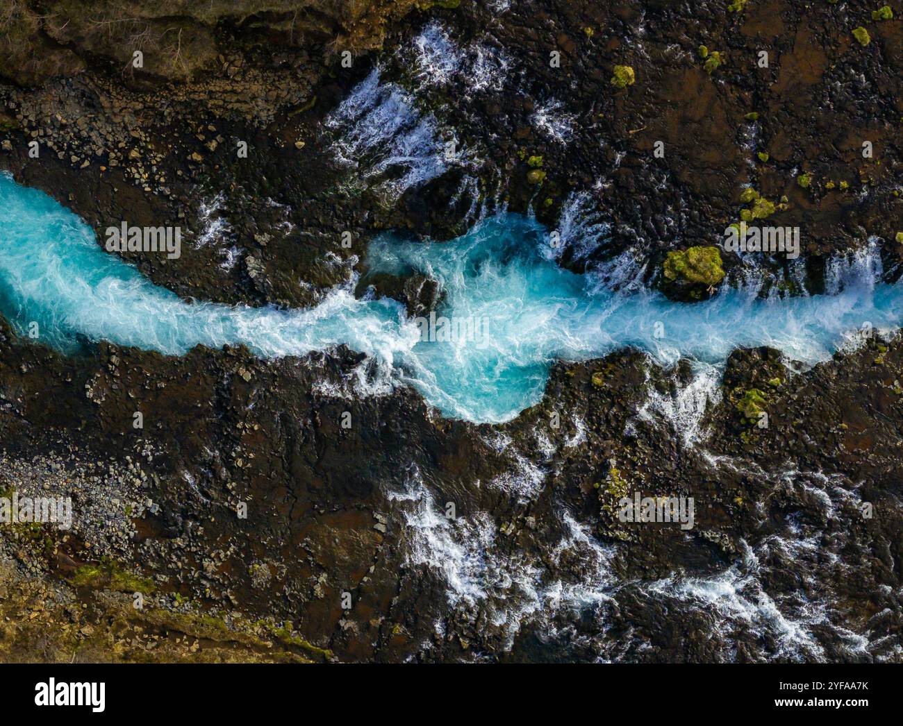 Aerial view of Bruarfoss Waterfall, Iceland's bluest waterfall with ...