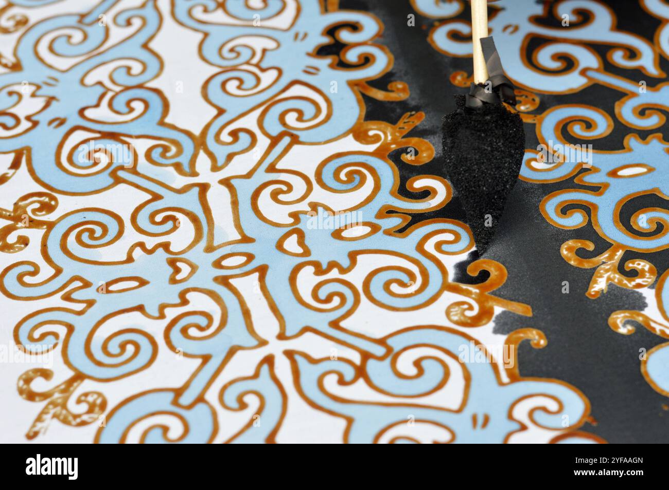 coloring process on Indonesian batik cloth Stock Photo - Alamy