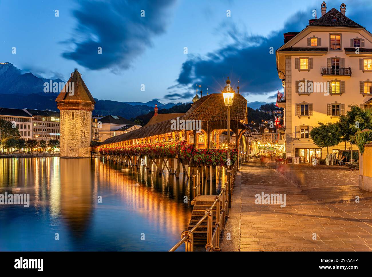 Historical Chapel Bridge, a landmark at the city of Lucerne at night ...