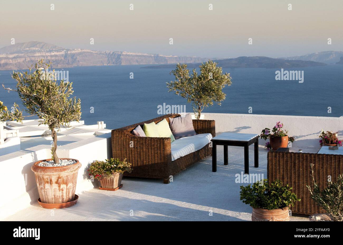 Roof garden cafe restaurant at the caldera facing the Aegean sea in the ...