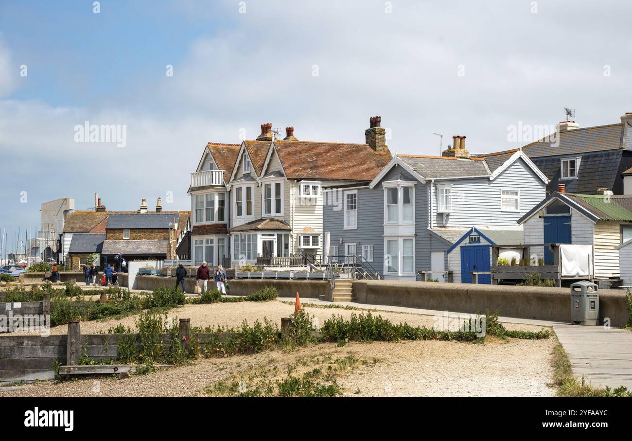 Whitstable, UK, June 8 2023: Tourists and locals walk along the ...