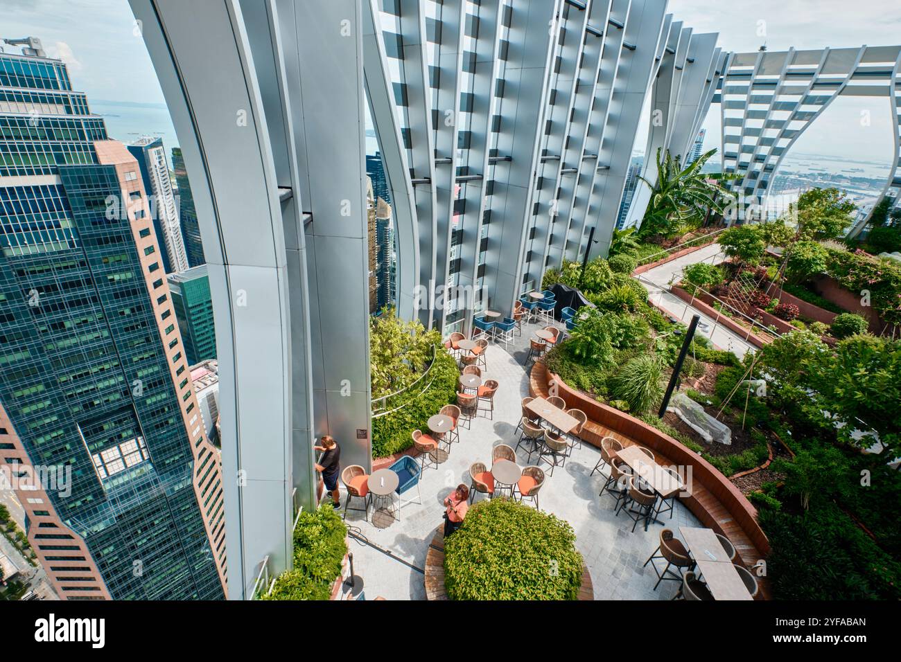 Singapore - August 16, 2024: CapitaSpring skyscraper with walkways and ...
