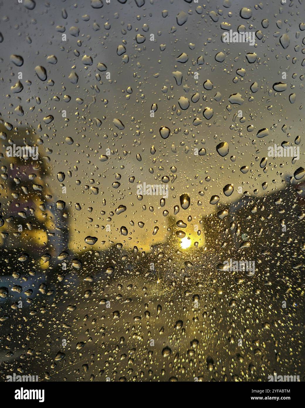 Raindrops on glass in evening hi-res stock photography and images - Alamy