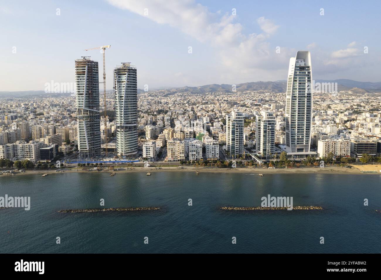 Drone aerial view of waterfront of modern coastal city with skyscrapers ...