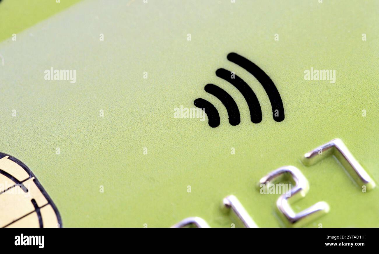 Green plastic Credit card with contactless symbol electronic chip and ...