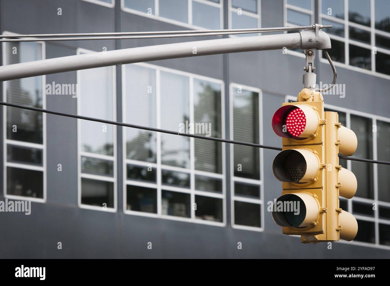 Yellow Traffic light with the red stop sign flashing from New York city ...
