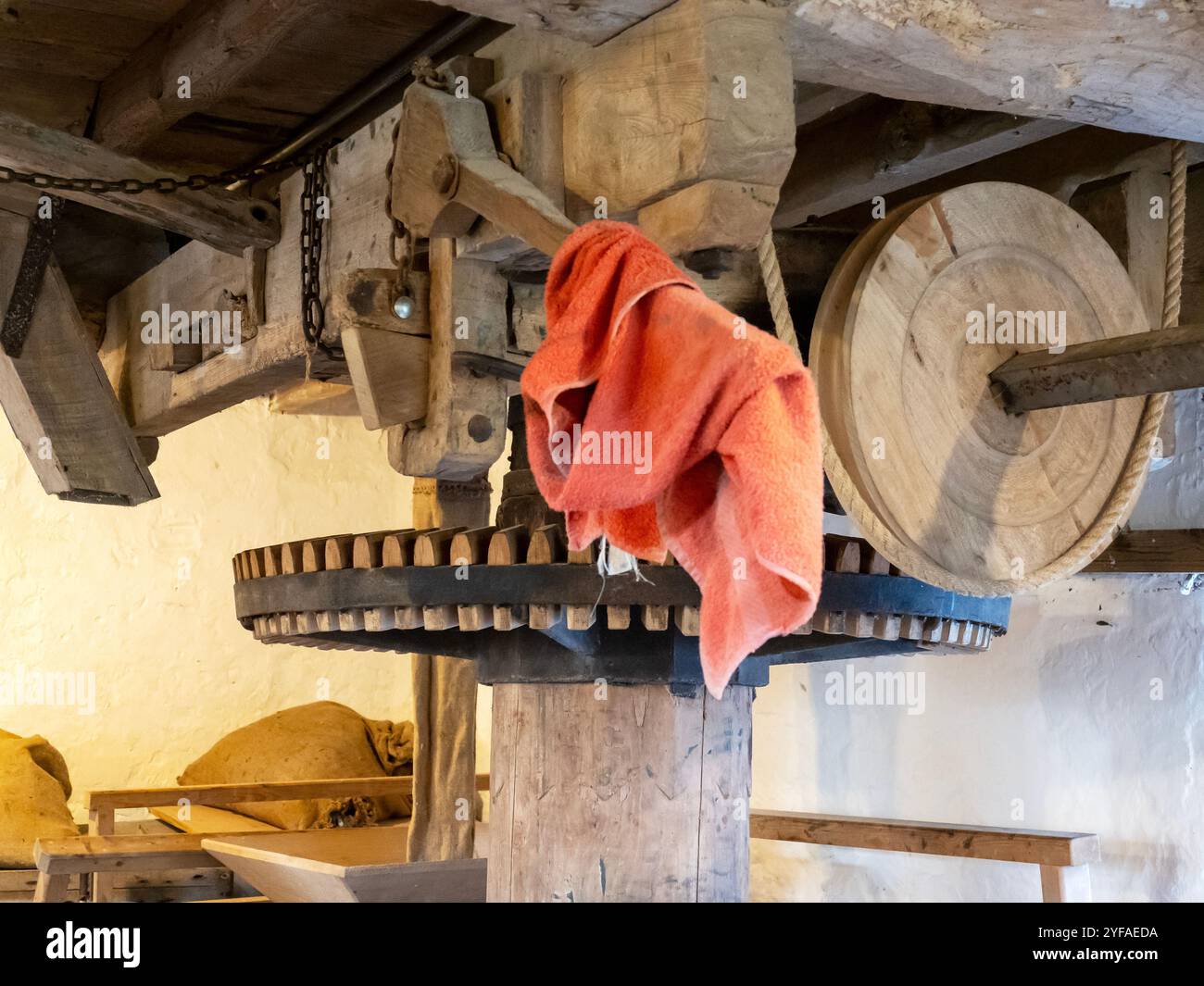 Cogs and wheels in an old watermill for grinding corn in Branscombe ...