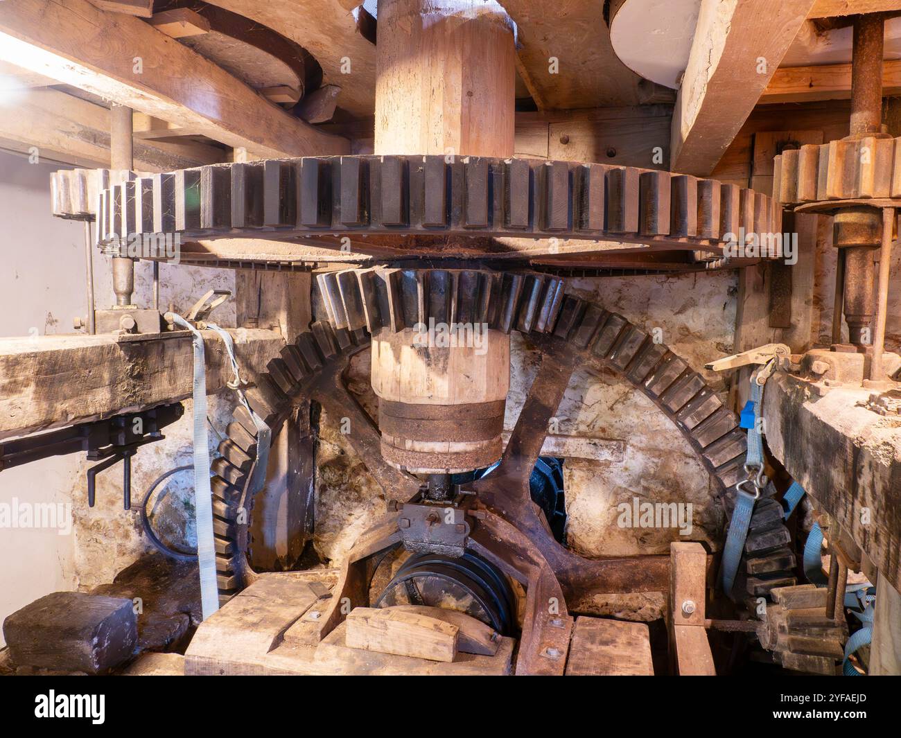Cogs and wheels in an old watermill for grinding corn in Branscombe ...