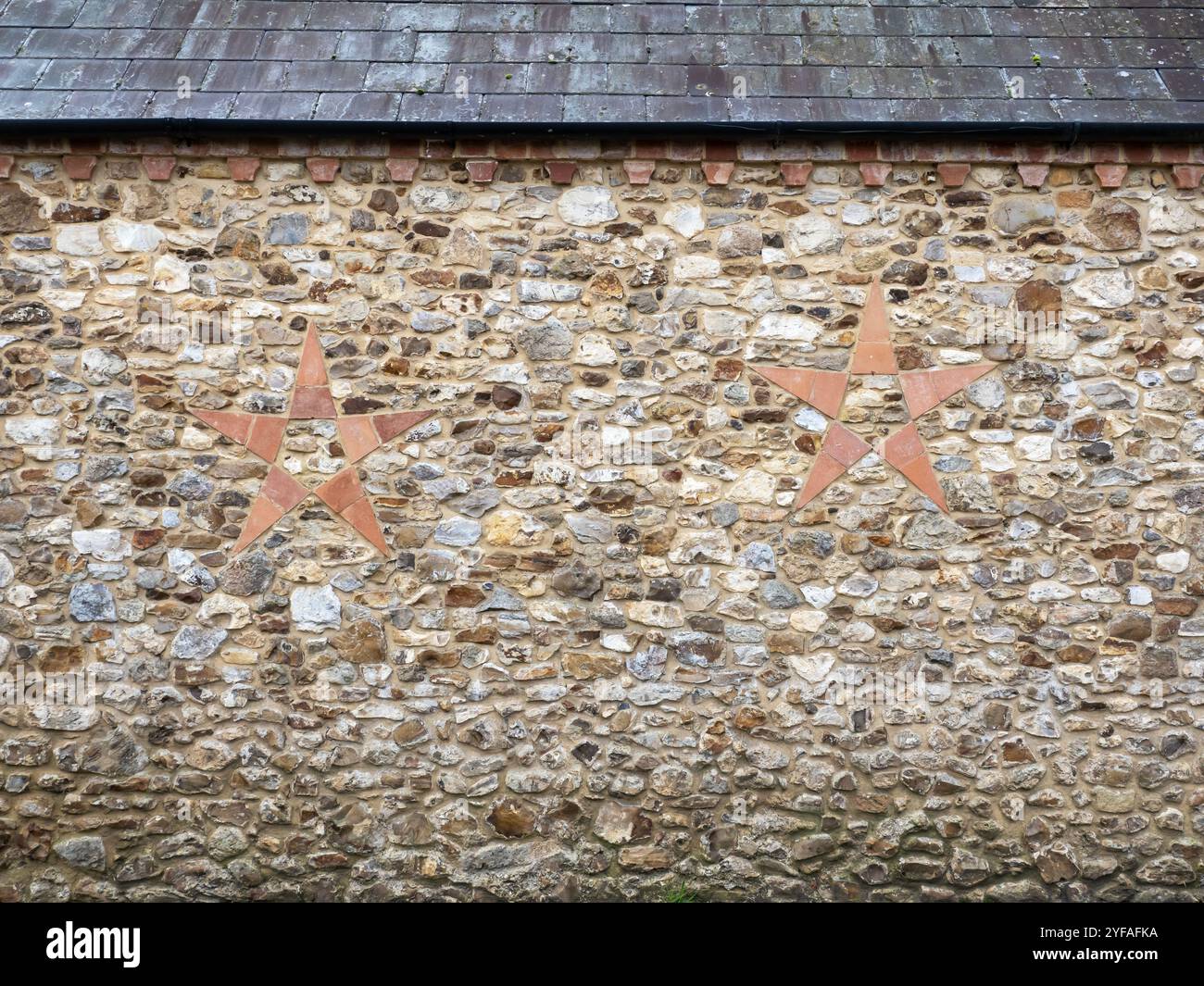 Stars in a farm wall in Colyton, Devon, UK Stock Photo - Alamy
