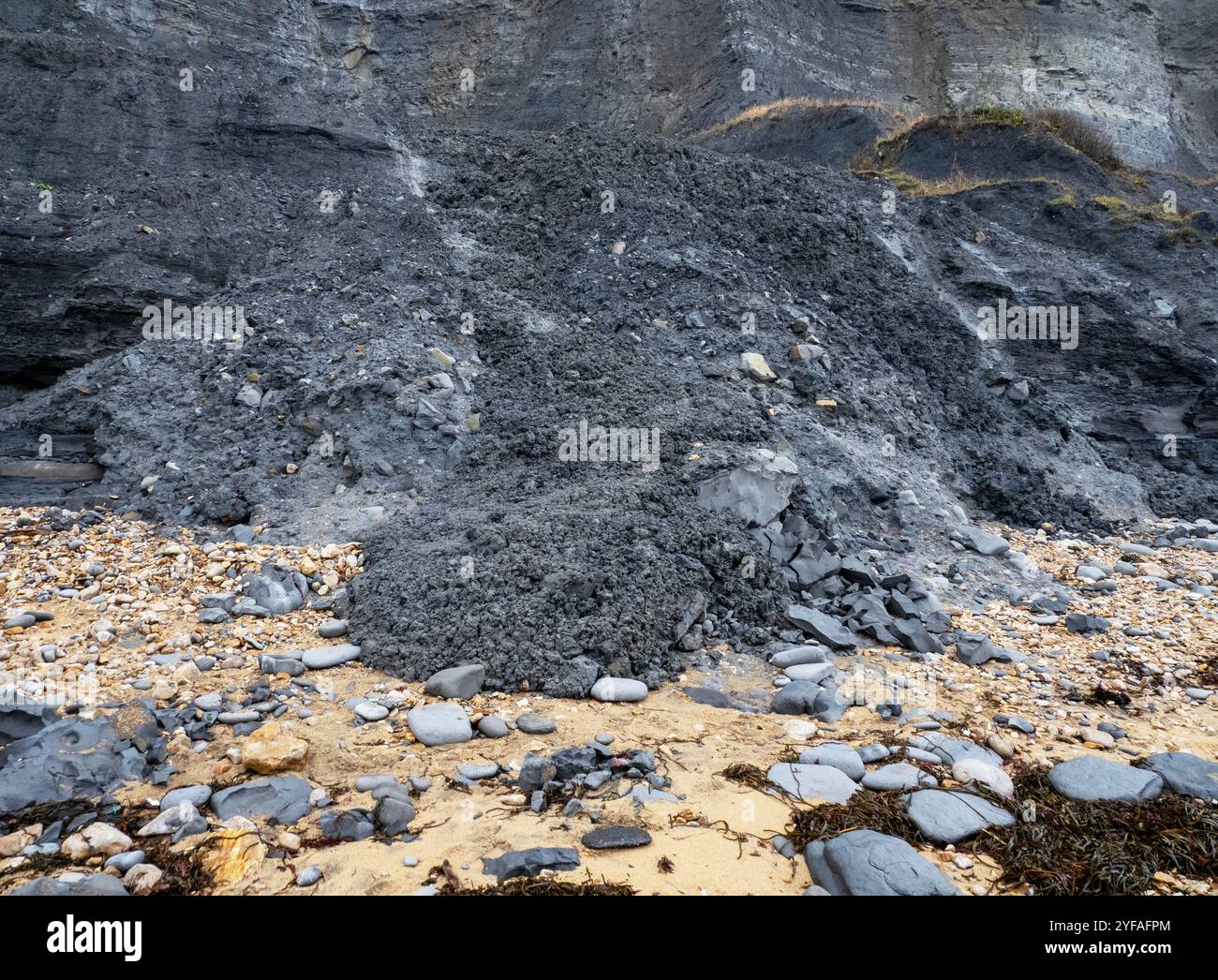Jurassic cliffs slumping onto the beach of Charmouth in Devon Stock ...