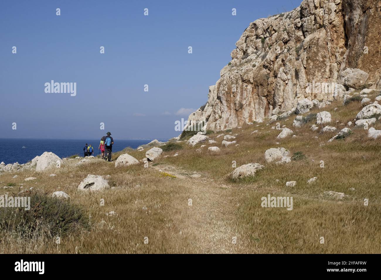 Group of unrecognised people trekking in nature on a trail. Healthy ...