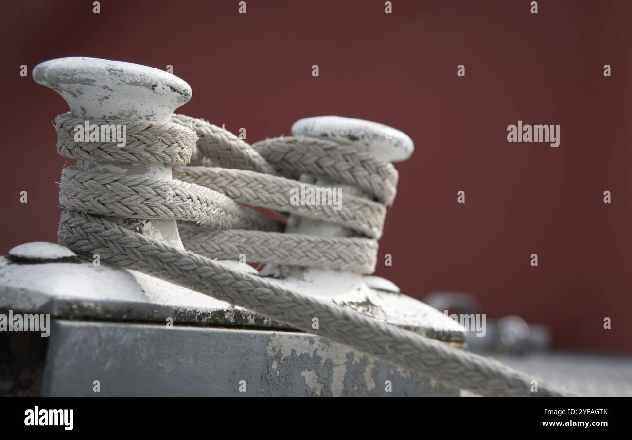 Twisted ship mooring strong rope for securing fishing boats tied on a ...