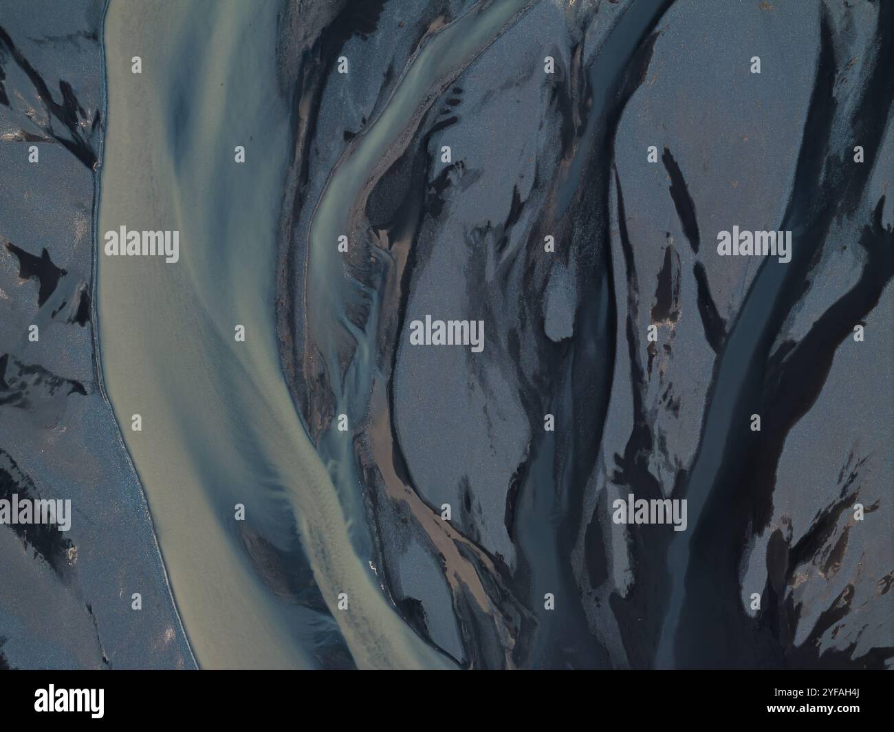 A glacial rivers from above. Aerial shot of the river streams from ...