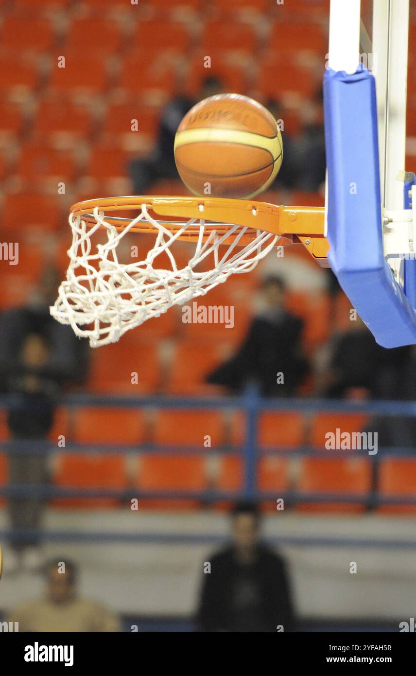 Basketball hoop and ball on target Stock Photo - Alamy