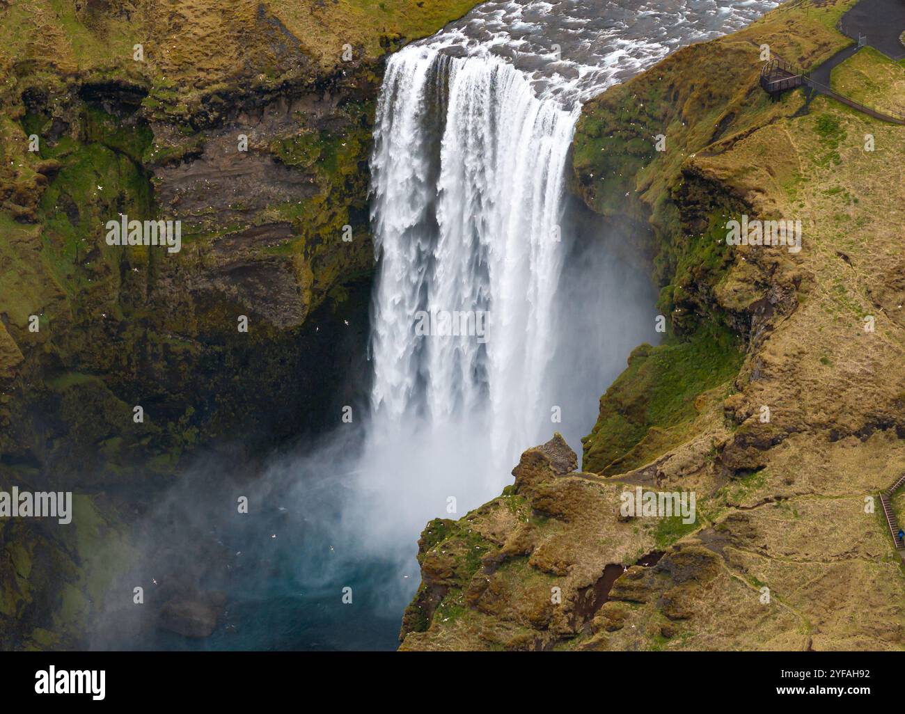 Skogafoss waterfall, a famous natural landmark and travel destination ...