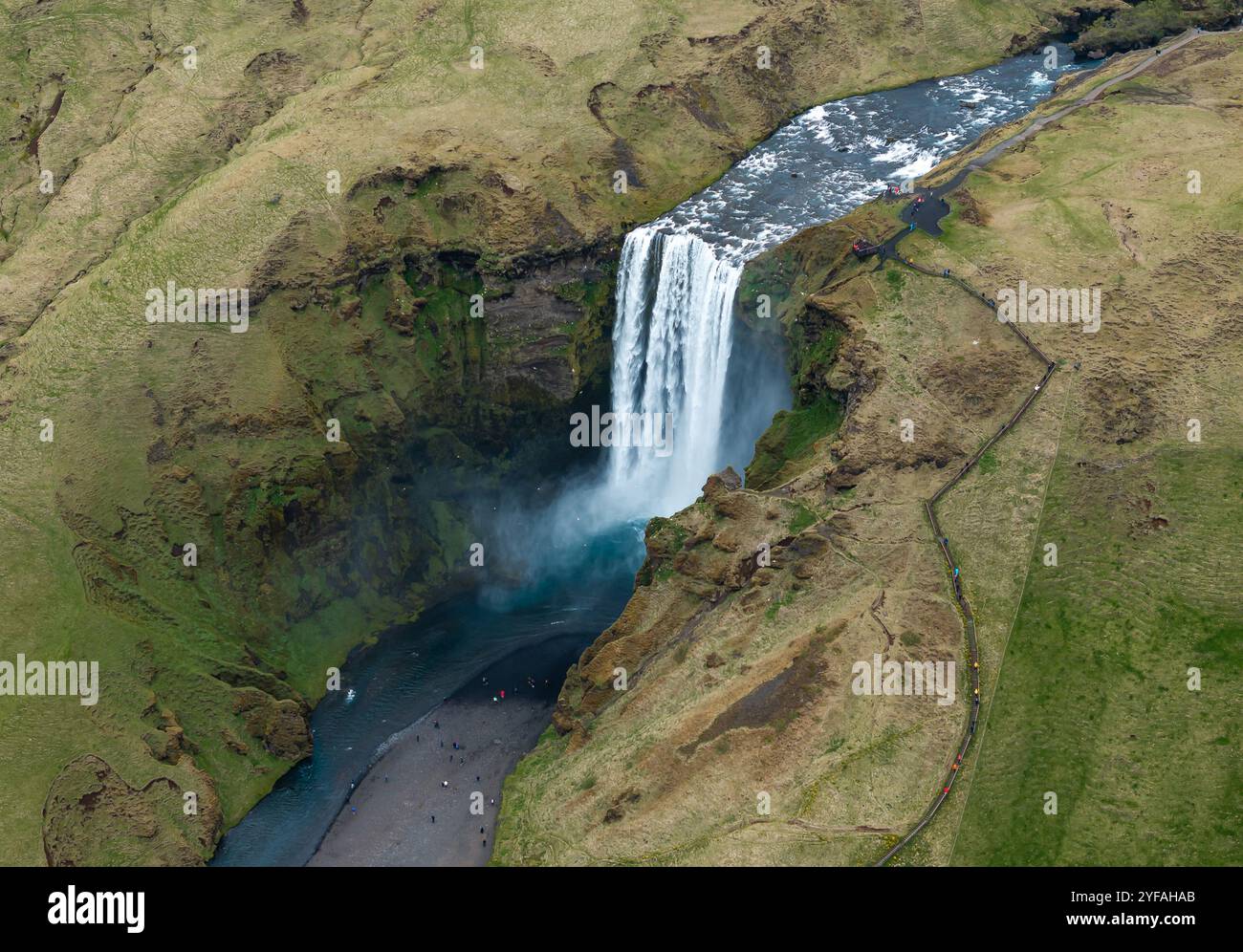 Skogafoss waterfall, a famous natural landmark and travel destination ...