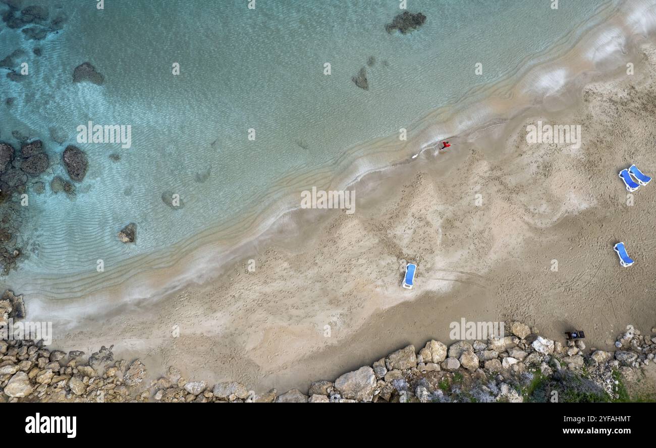 Aerial drone view of empty sandy beach with golden sand. Protaras ...