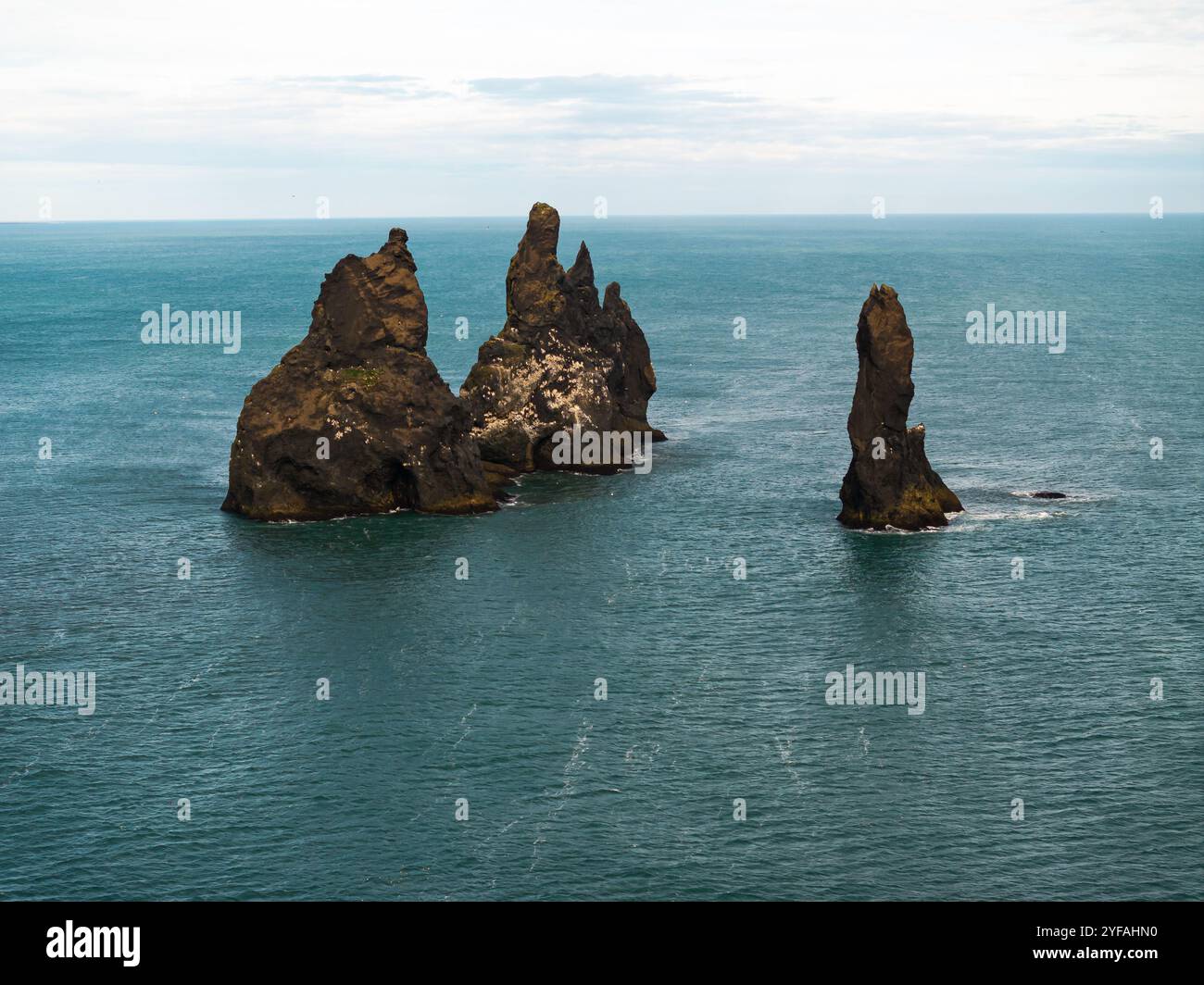 Aerial view of the cliffs and sea stacks at Reynisfjara black sand ...