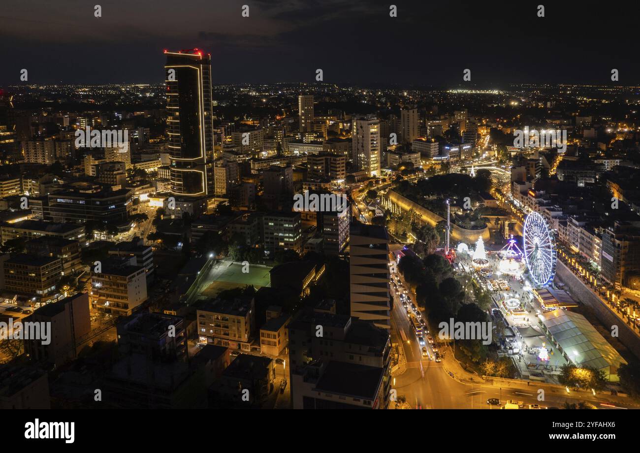 Aerial drone photograph of the cityscape of Nicosia in Cyprus at night ...
