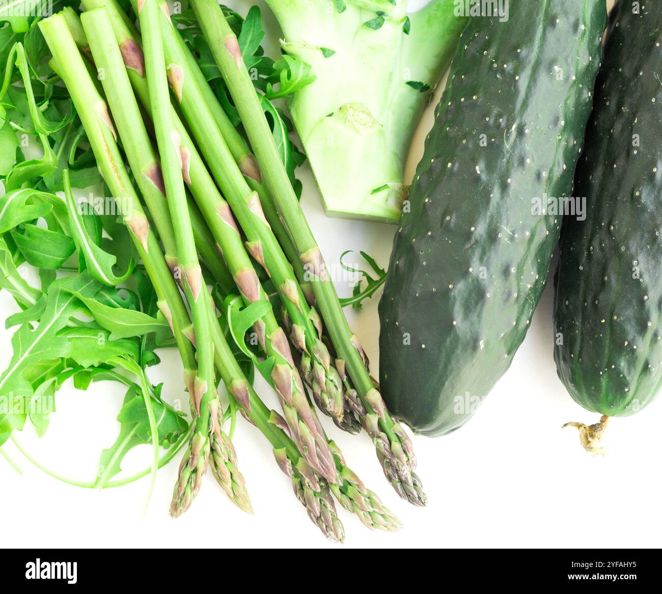 Still life from green farm vegetables, arugula, broccoli, asparagus and ...