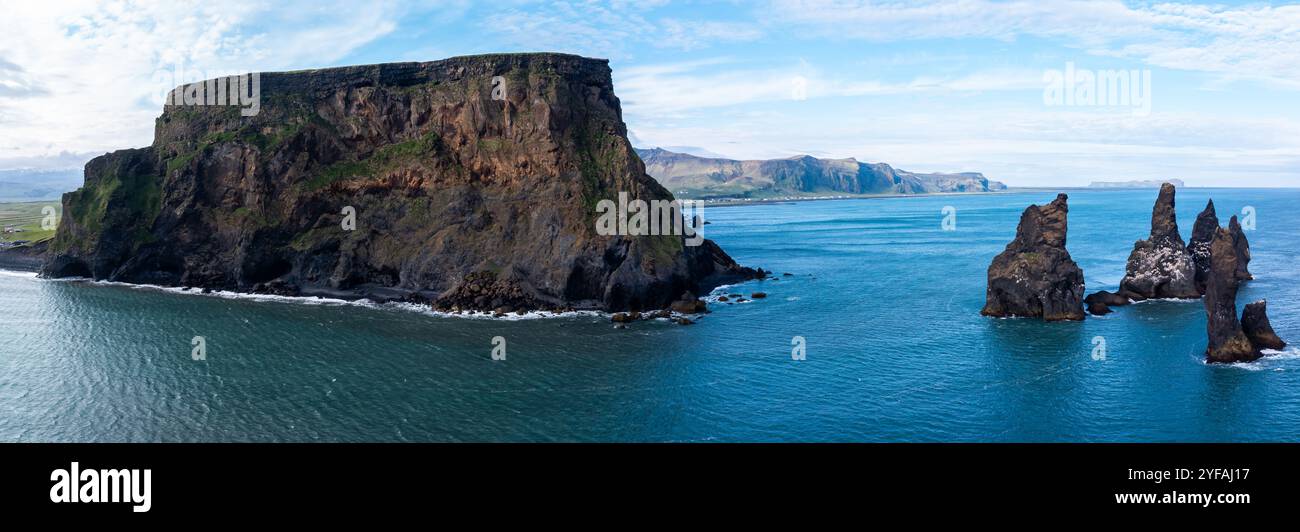 Aerial view of the cliffs and sea stacks at Reynisfjara black sand ...