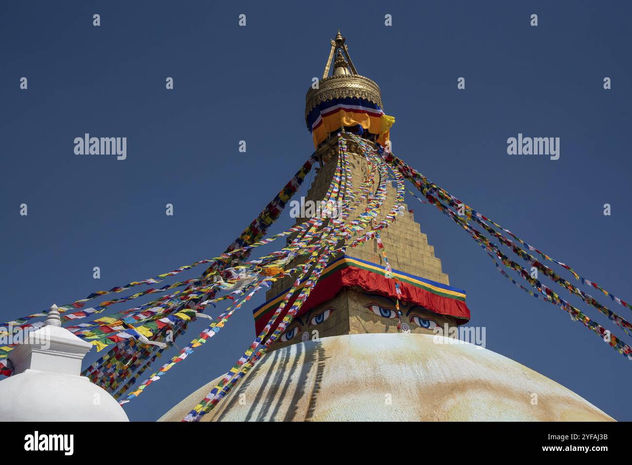 Boudha Stupa, at Kathmandu in Nepal against blue sky, with religious ...